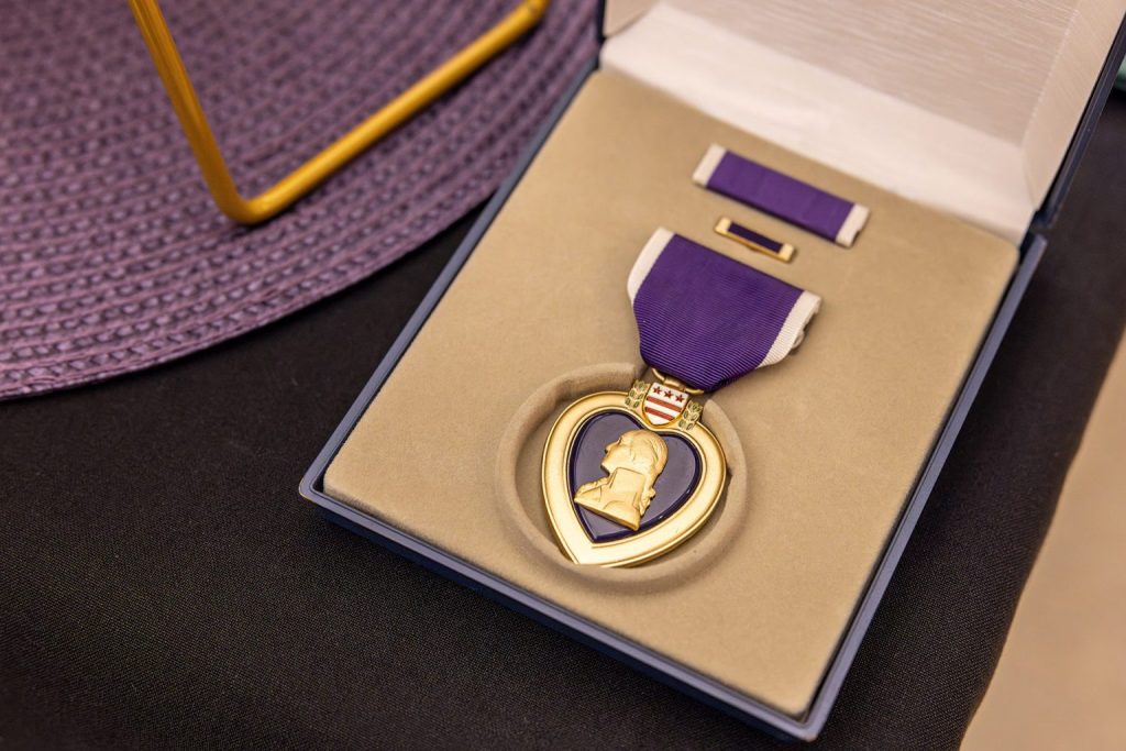 Disney Cast Member Awarded Purple Heart at American Pavilion in EPCOT